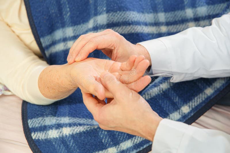 Doctor Measures the Pulse on the Arm Stock Photo - Image of heart ...