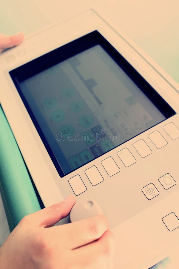 Doctor with medical device stock photo. Image of human - 57470834