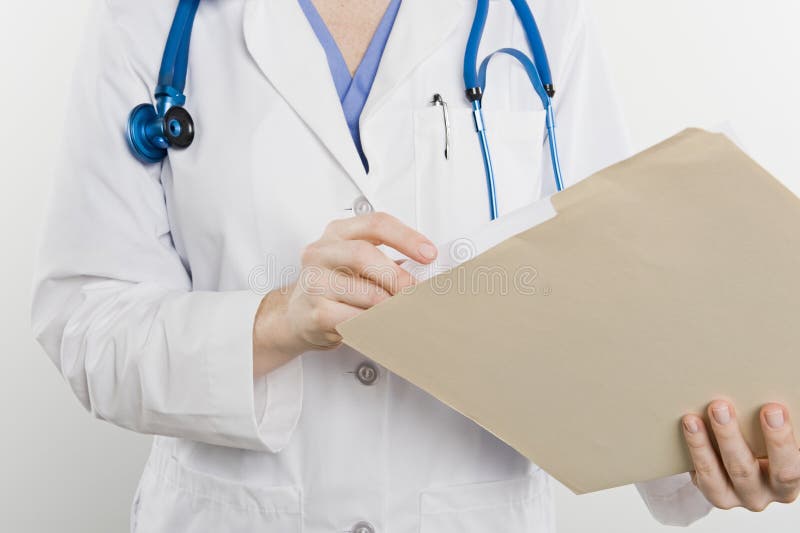 Doctor with Medical File stock photo. Image of file, standing - 29665888