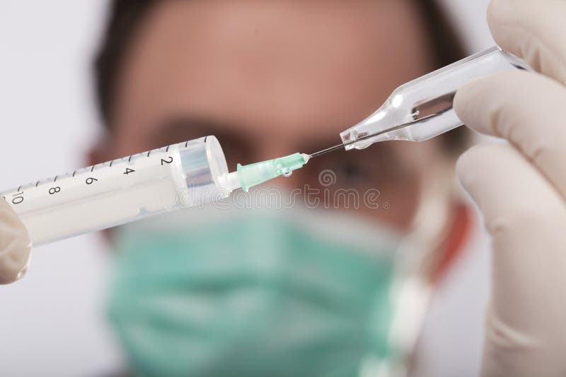 Doctor analyzing a CT scan stock photo. Image of coat - 14211654