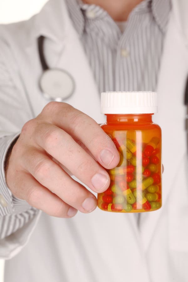 Doctor with Medication in Prescription Bottles Stock Image - Image of ...