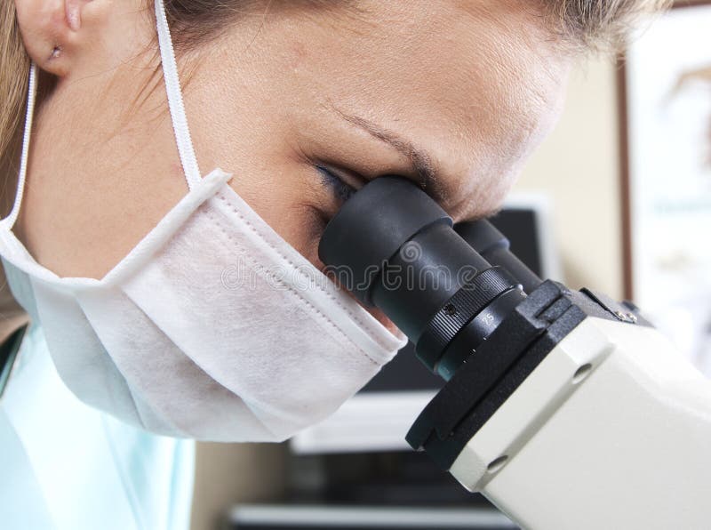Doctor with microscope stock photo. Image of sampling - 14594010