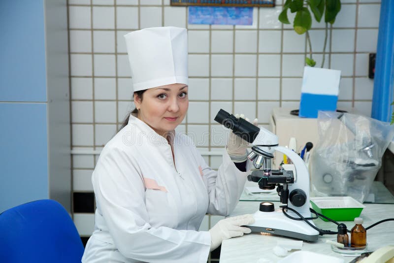Doctor with Microscope in Lab Stock Image - Image of biotechnology ...