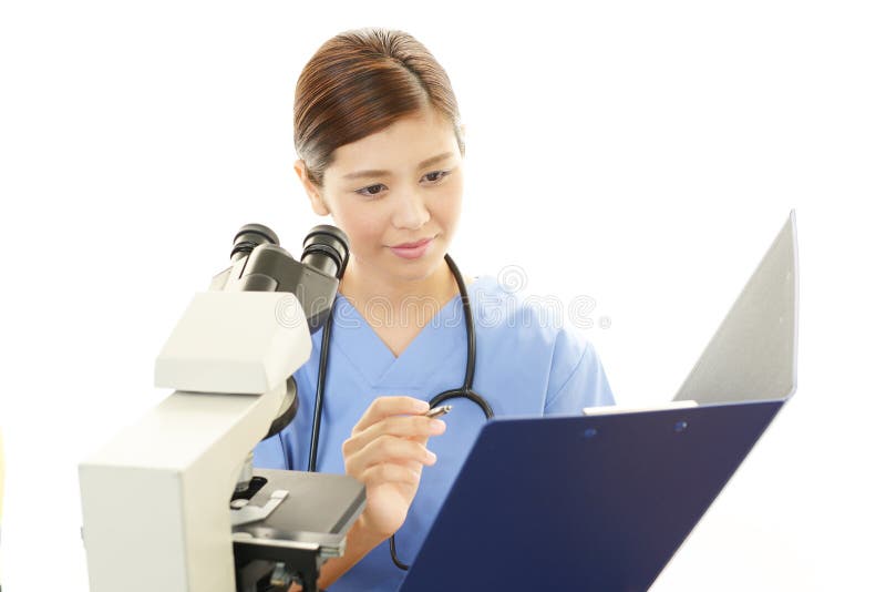 Doctor with a Microscopic Examination Stock Photo - Image of adult ...