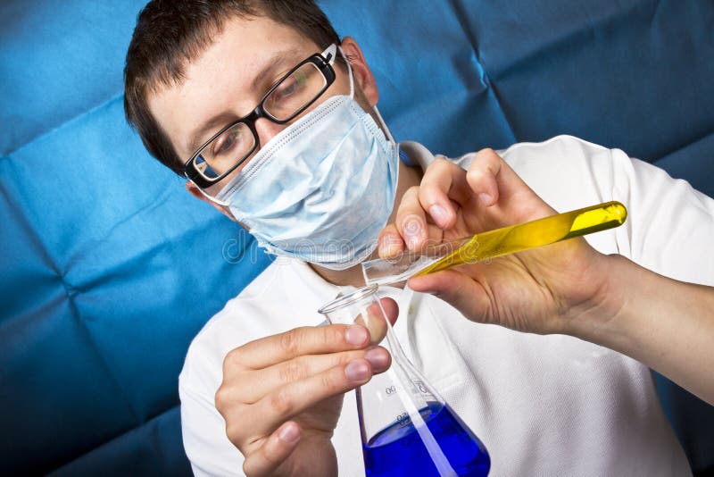 Doctor mixing medicine stock photo. Image of scientist - 23197896