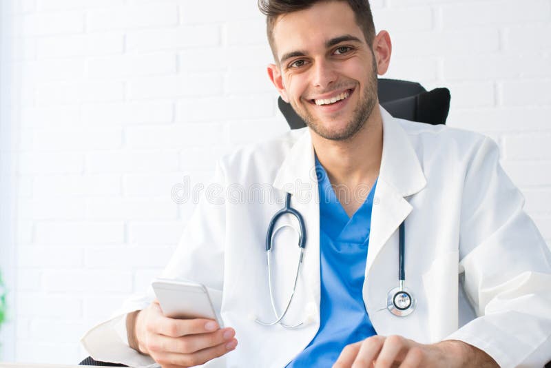 Doctor with mobile phone stock photo. Image of consultation - 161748252