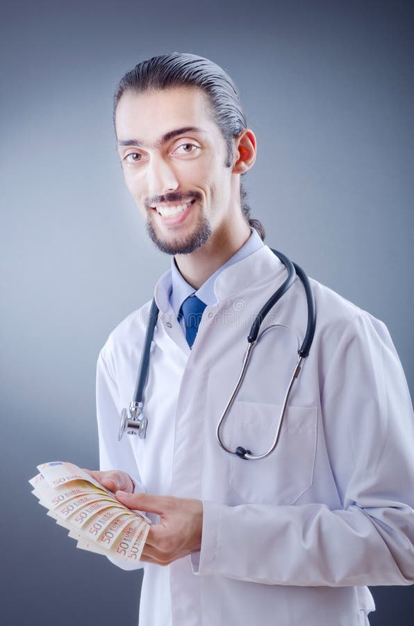 Doctor with money stock photo. Image of money, hospital - 30714318