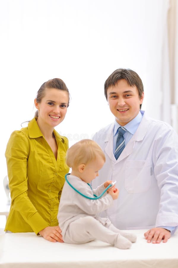Doctor and Mother with Baby on Examination Stock Photo - Image of ...