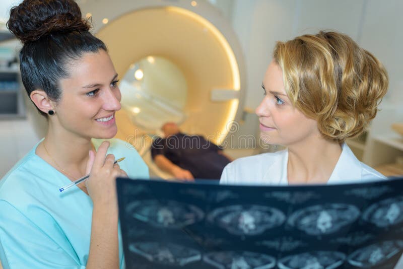 Doctor and Nurse Checking Mri Results Stock Image - Image of radiology ...