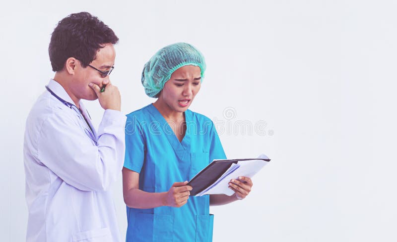 Doctor and Nurse Checking Patient Information Stock Photo - Image of ...