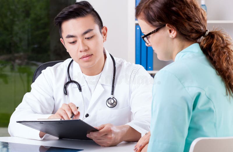 Doctor with Patient in Clinic Consulting Stock Image - Image of ...