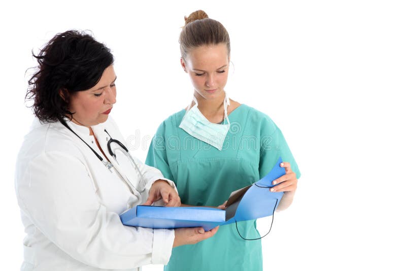 Doctor and Nurse Discussing Patient Records Stock Photo - Image of ...