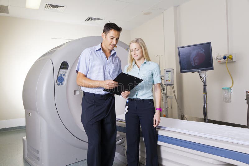 Doctor and Nurse with MRI Scanner Stock Photo - Image of radiation ...