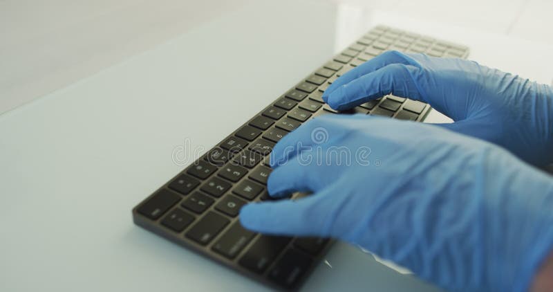 Doctor or Nurse or Office Worker Using Protective Gloves Writting on ...