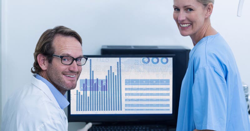 Doctor and Nurse Standing in Front of Desktop Computer Stock Image ...