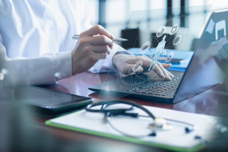 A Doctor in the Office Interacts with the Digestive System Stock Photo ...
