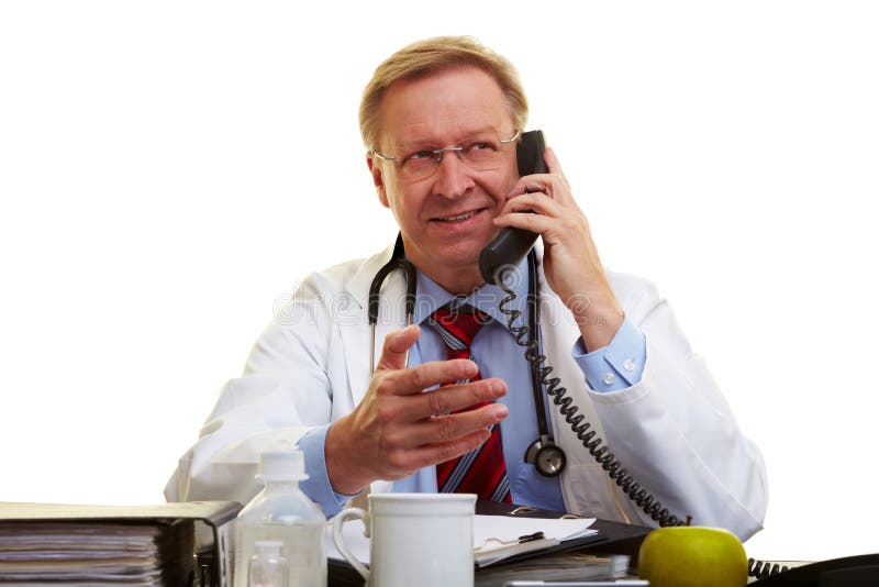 Doctor in office on phone stock image. Image of consultation - 15444789