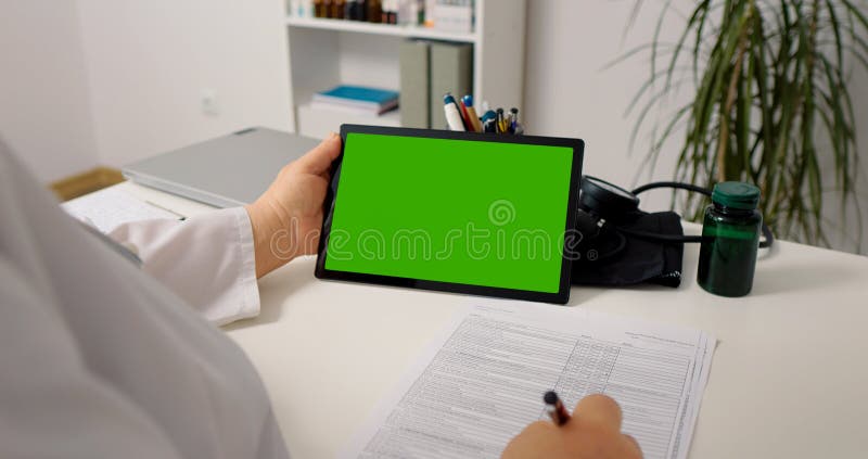 Doctor on Online Conference Using Gadgets Taking Notes. Stock Photo ...