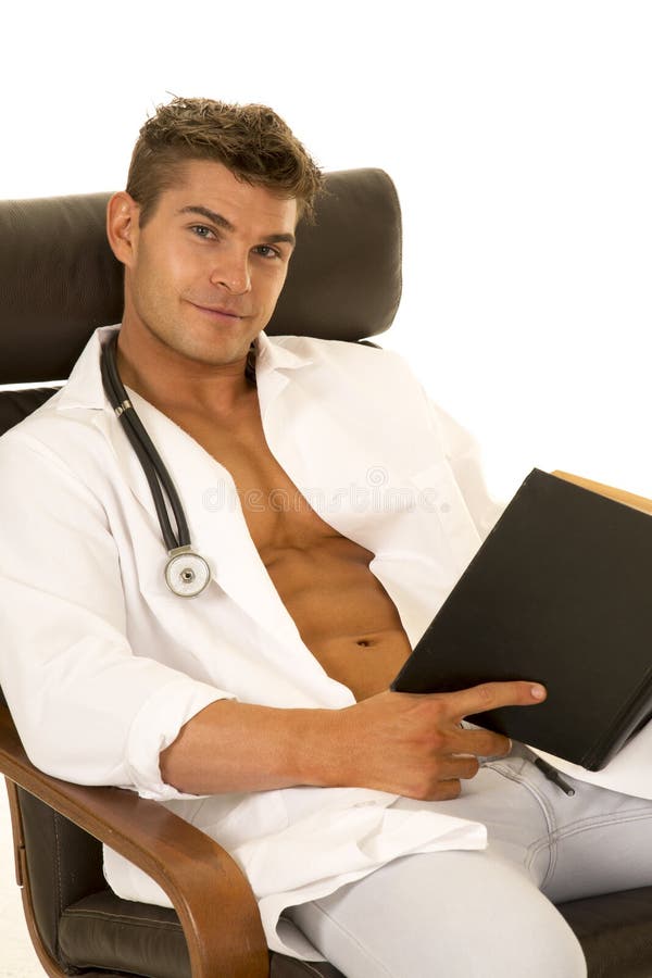 Doctor with Open Jacket with Book Sitting Look Stock Photo - Image of ...