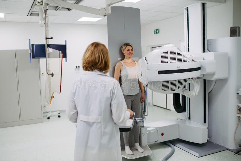 Doctor Operating Dynamic X-ray Scan Using Tilting Fluoroscopy Unit ...