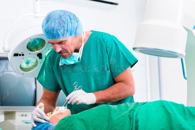 Doctor in Operation in Operating Room Stock Photo - Image of caucasian ...