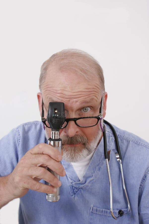 Doctor Looking Through Ophthalmoscope Stock Photo - Image of expert ...