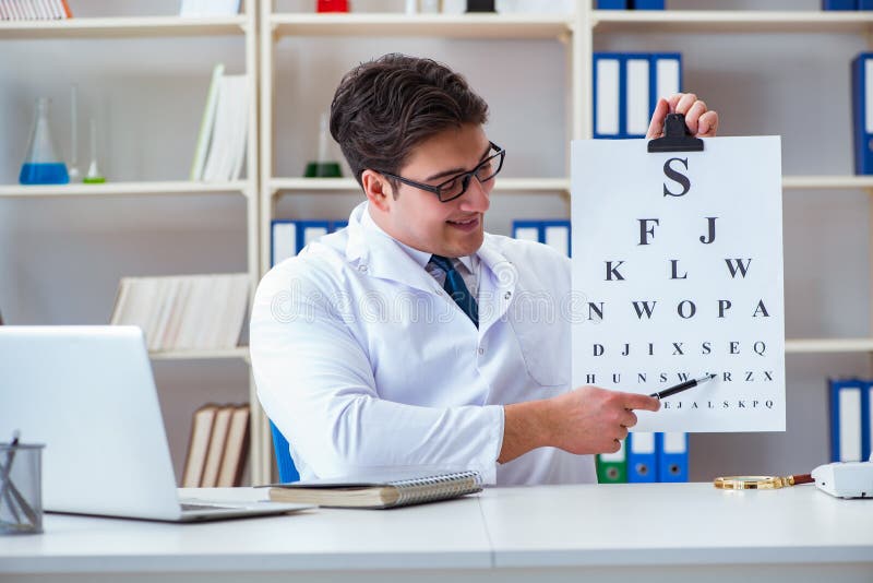 The Doctor Optician with Letter Chart Conducting an Eye Test Check ...