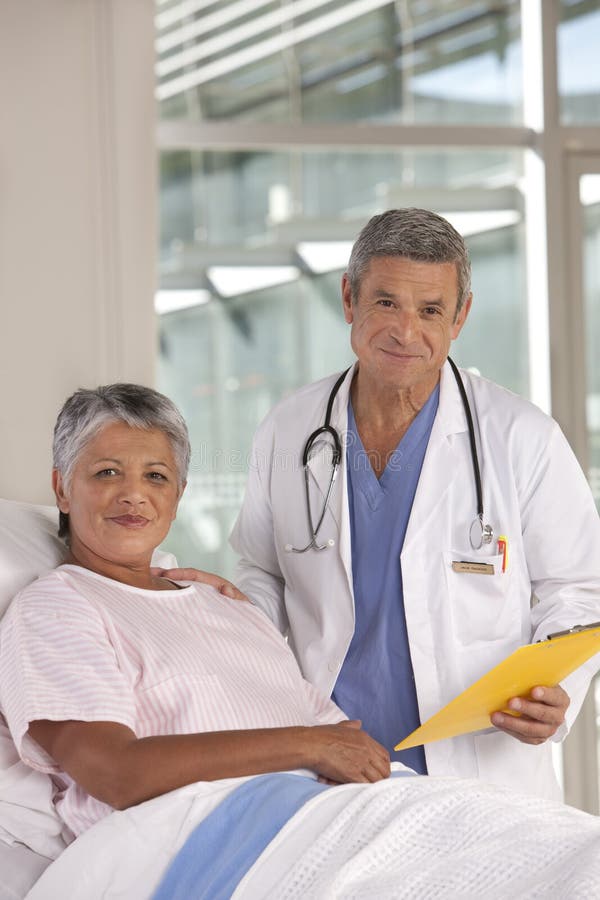 Male doctor and patient stock image. Image of female - 10472373