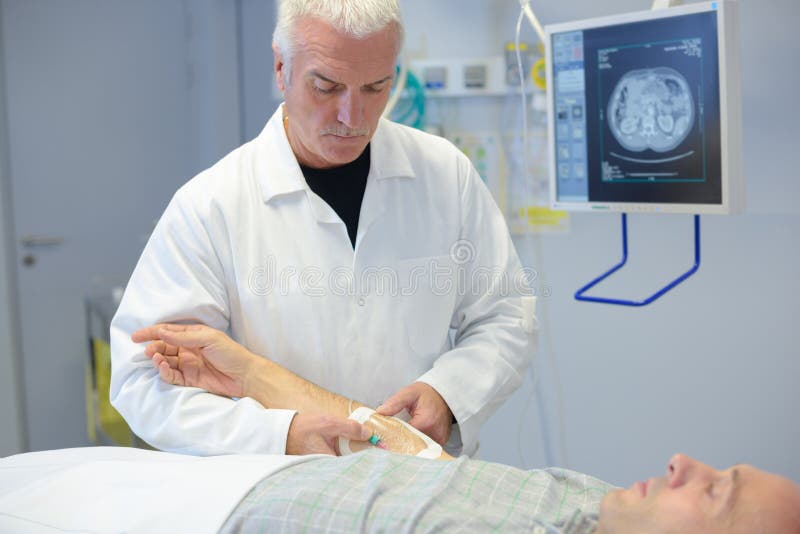 Doctor with patient stock photo. Image of scan, patient - 259684110