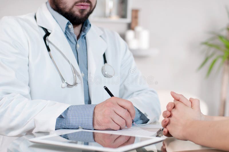 Doctor and Patient are Discussing Something Stock Image - Image of ...