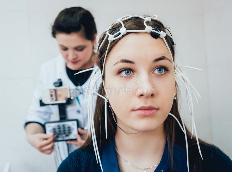 Doctor and Patient with Encephalography Electrode. Electroencephalogram ...