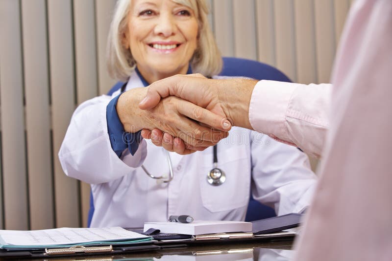 Doctor and Patient Giving Handshake after Consultation Stock Photo ...