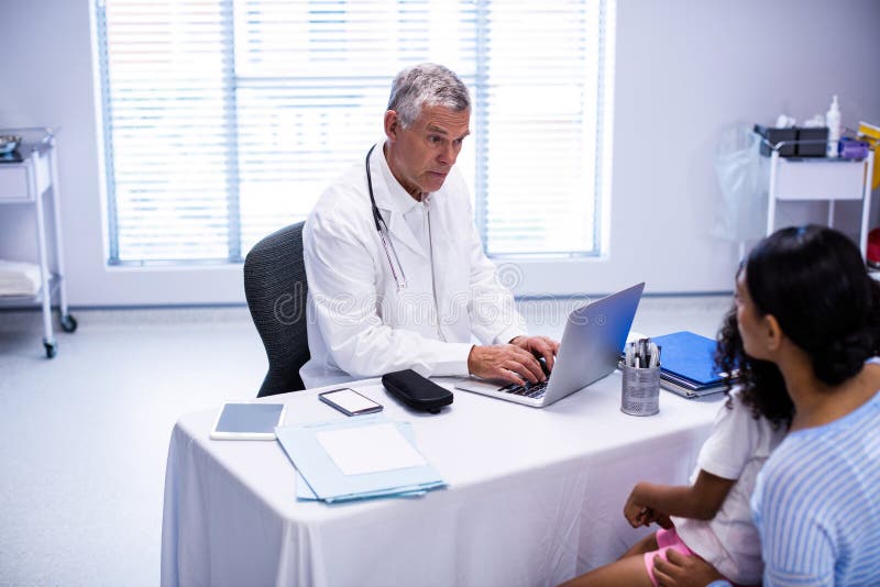 Doctor and Patient Interacting with Each Other Stock Image - Image of ...