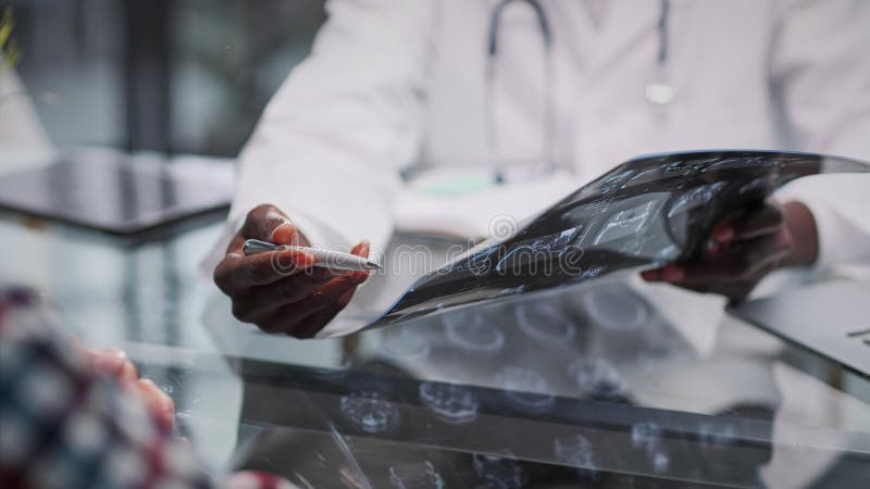 Patient at a Reception at the Doctor Looking an X-ray Stock Photo ...