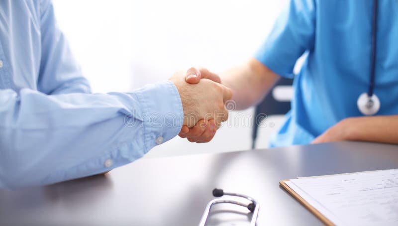 Doctor and Patient at the Table. Solution Stock Photo - Image of ...