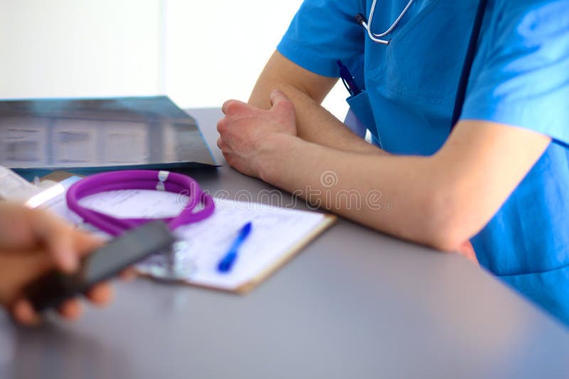 Doctor and Patient at the Table. Solution Stock Photo - Image of ...