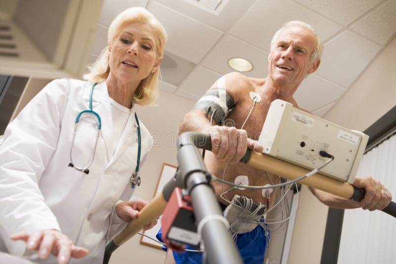 Doctor with Patient on Treadmill Stock Photo - Image of medicine ...