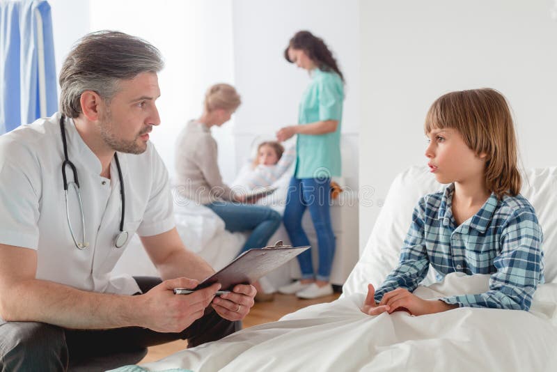 Doctor and the patient stock image. Image of child, children - 198833151