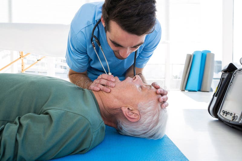 Doctor Performing Resuscitation on Patient Stock Image - Image of ...