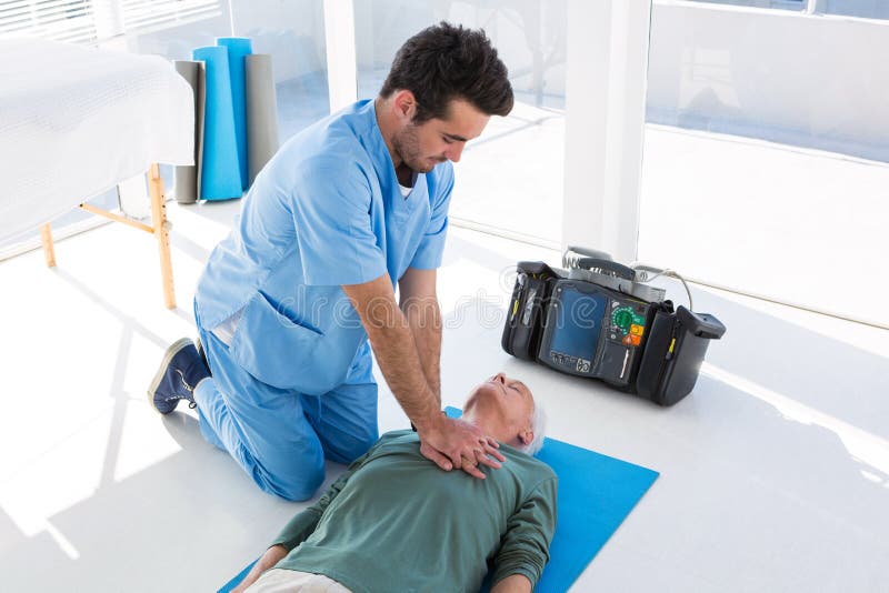 Paramedic Performing Resuscitation on Patient Stock Image - Image of ...