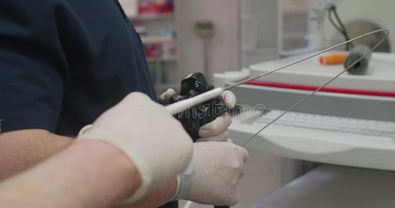 The Doctor Performs a Gastroscopic Examination with the Collection of ...