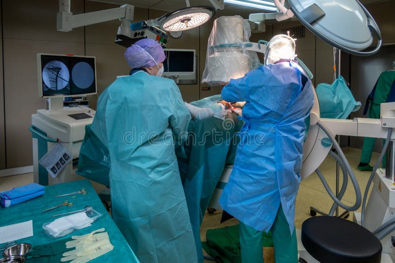 Doctor Performs a Surgical Operation with an X-ray Machine Stock Image ...