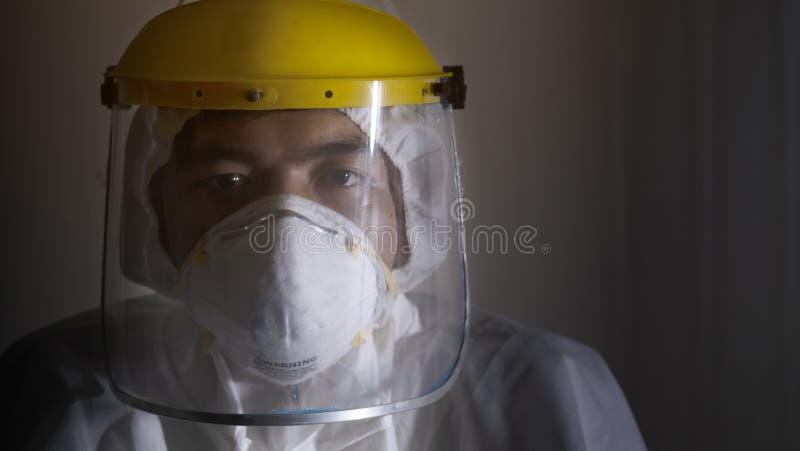 Doctor in Personal Protective Equipment or PPE. Stock Photo - Image of ...