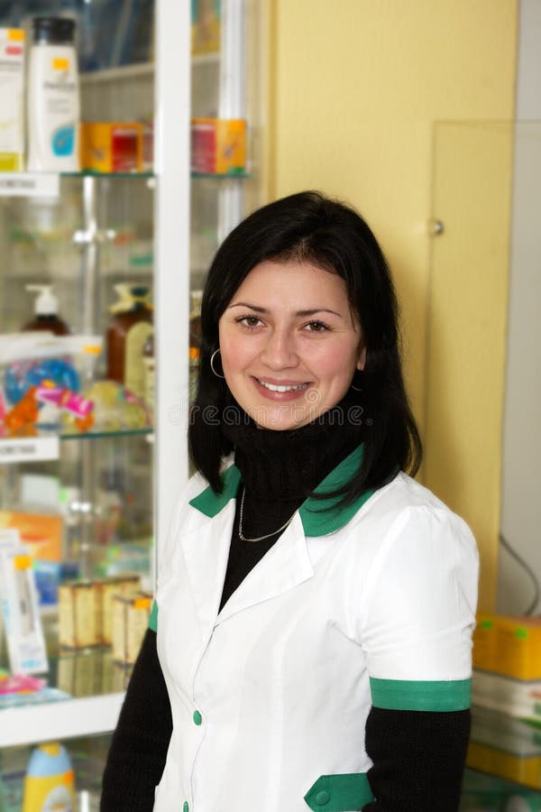 Doctor at pharmacy stock image. Image of brunette, pharmacist - 27462787
