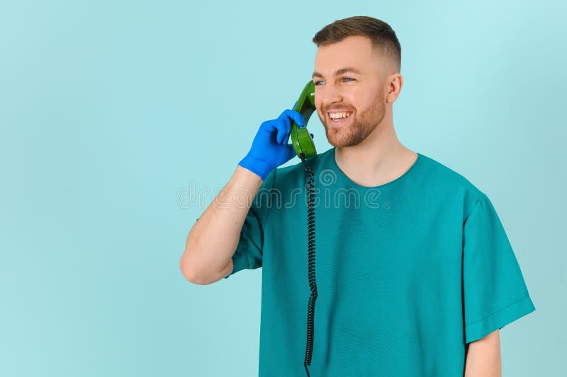 Doctor with Phone on a Blue Background. Doctor Call Concept Stock Photo ...