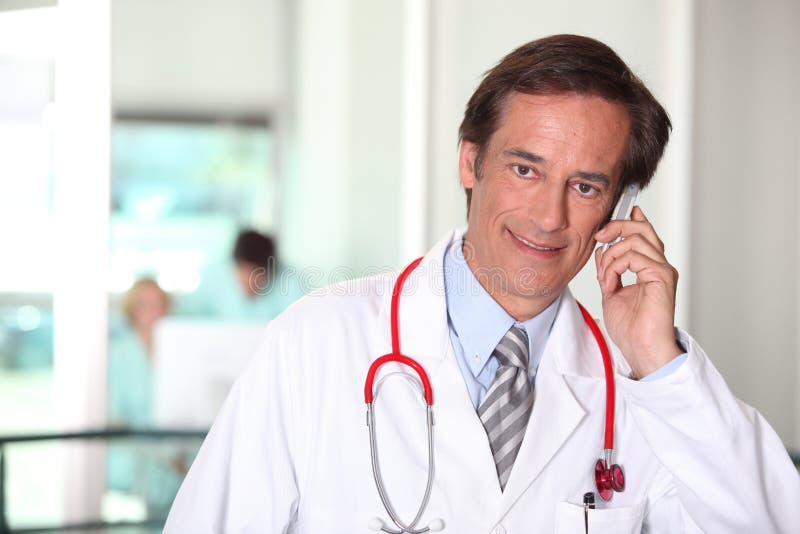 Doctor on the phone stock photo. Image of private, specialist - 33514162