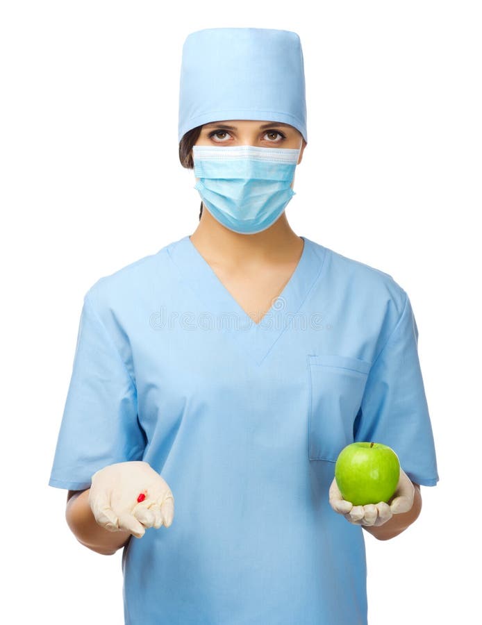 Doctor with pill and apple stock image. Image of care - 30376535