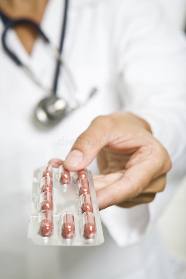 Doctor with pills stock photo. Image of hand, prescribe - 12315172