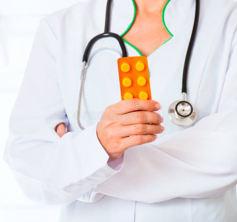 Doctor with pills stock image. Image of person, prescription - 47523919