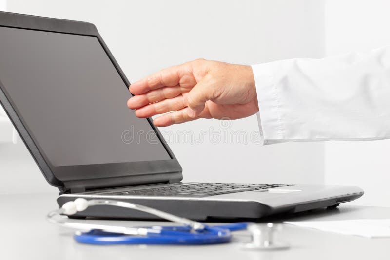 Doctor Pointing Computer Display by Hand Stock Image - Image of laptop ...